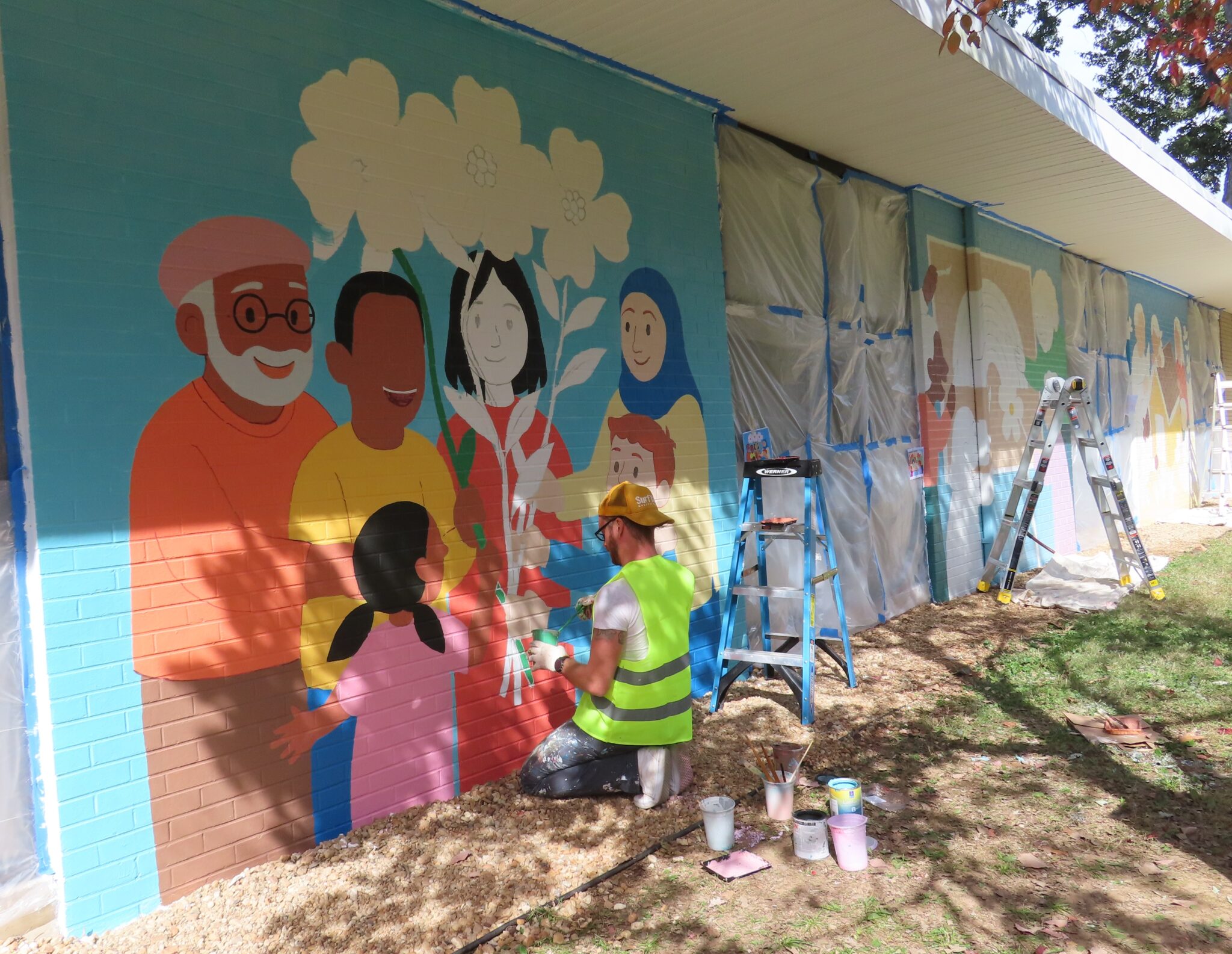 A new mural brightens up a church facade - Annandale Today
